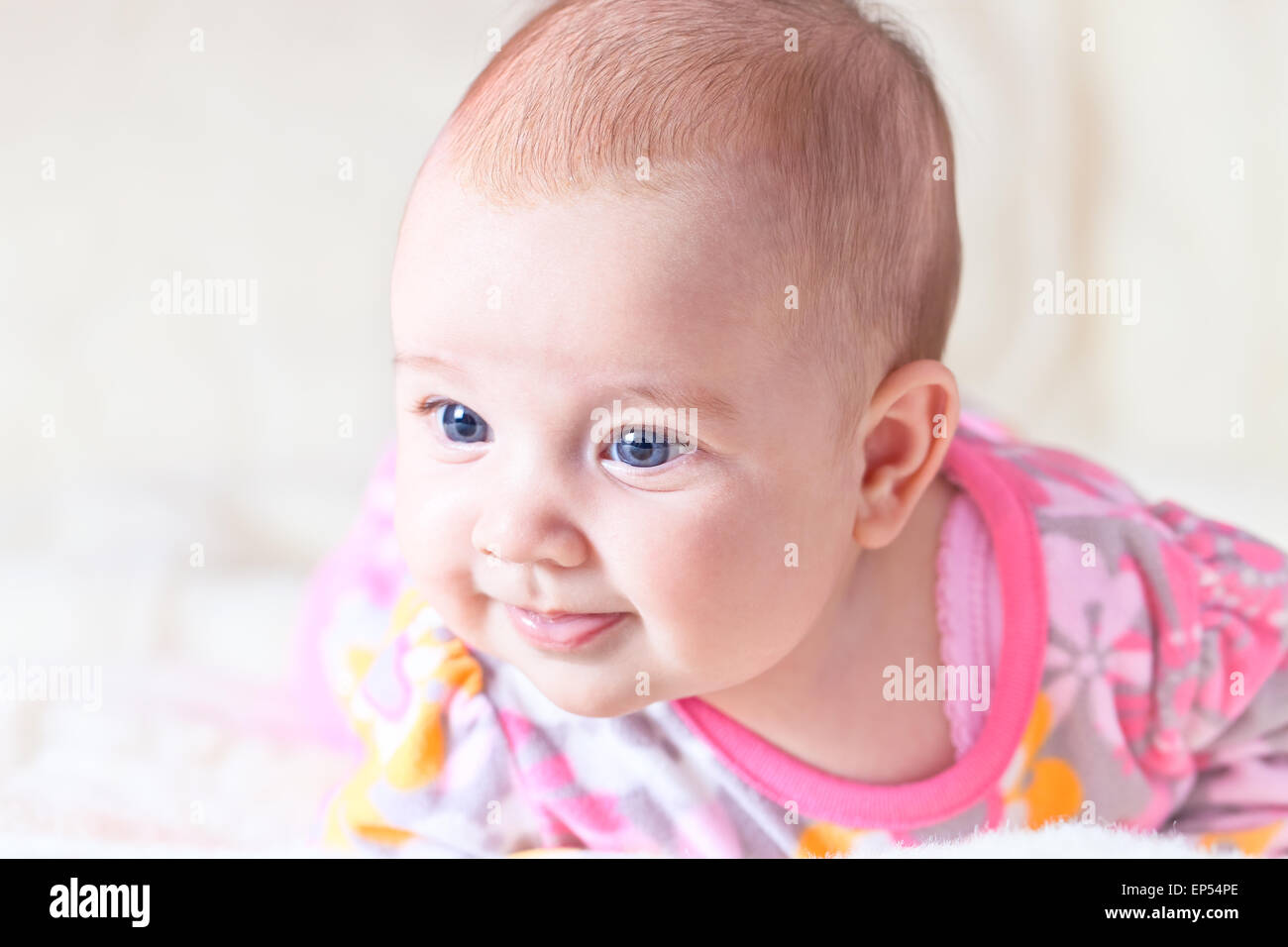 little girl on a soft woolen blanket Stock Photo - Alamy