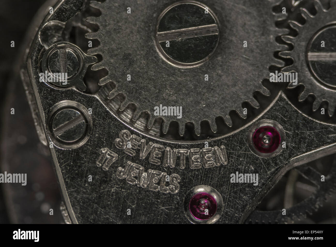 Macro-photo of Swiss wristwatch mechanism. Key focus on the area around ...