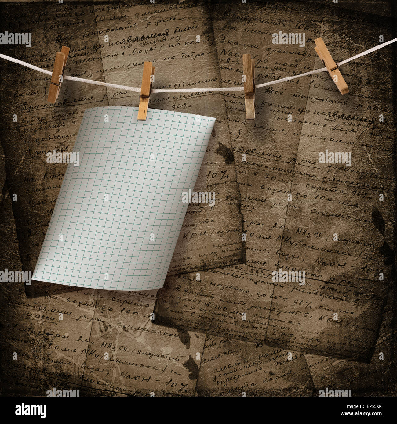 Old sheets hanging on a rope and clothespins on the brown abstract ...