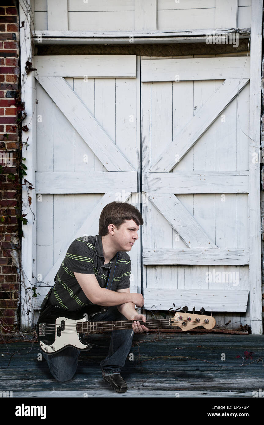 Man with Bass Guitar Stock Photo - Alamy