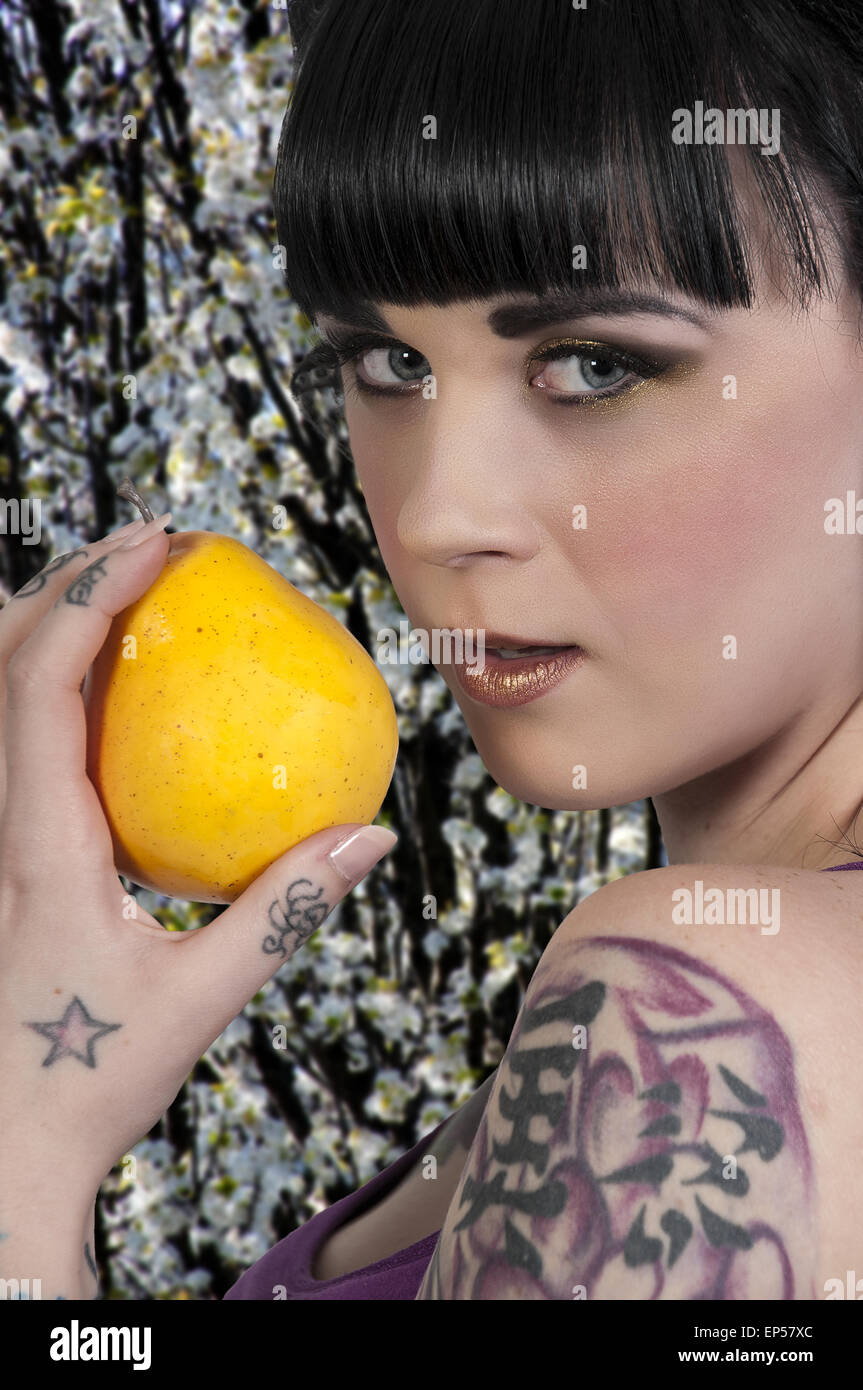 Biting into a pear hi-res stock photography and images - Alamy