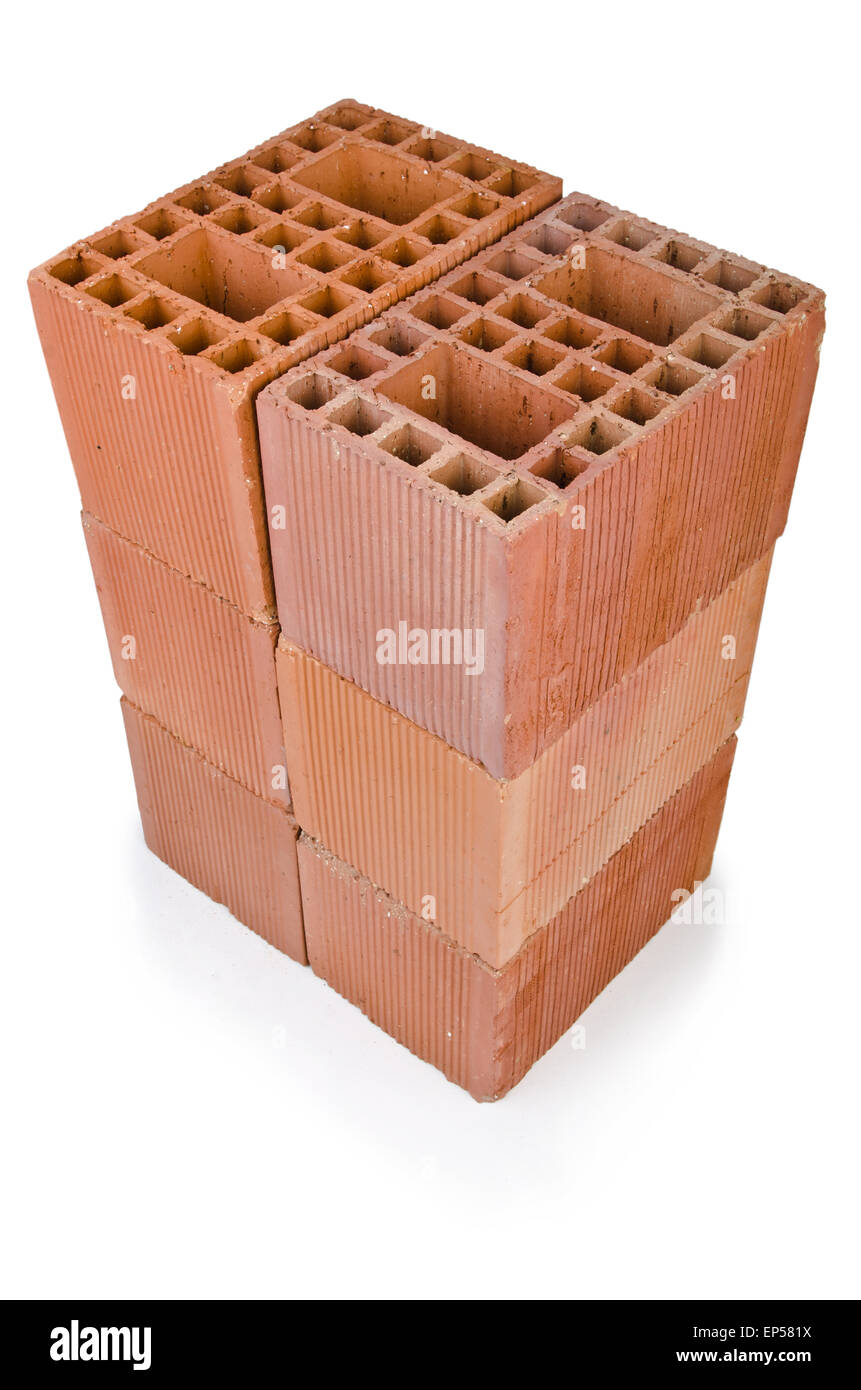 Stack of clay bricks isolated on white Stock Photo - Alamy