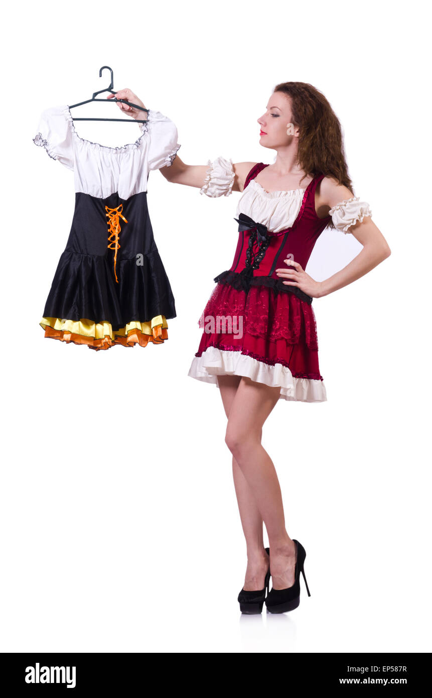 Woman trying to choose dress on white Stock Photo - Alamy