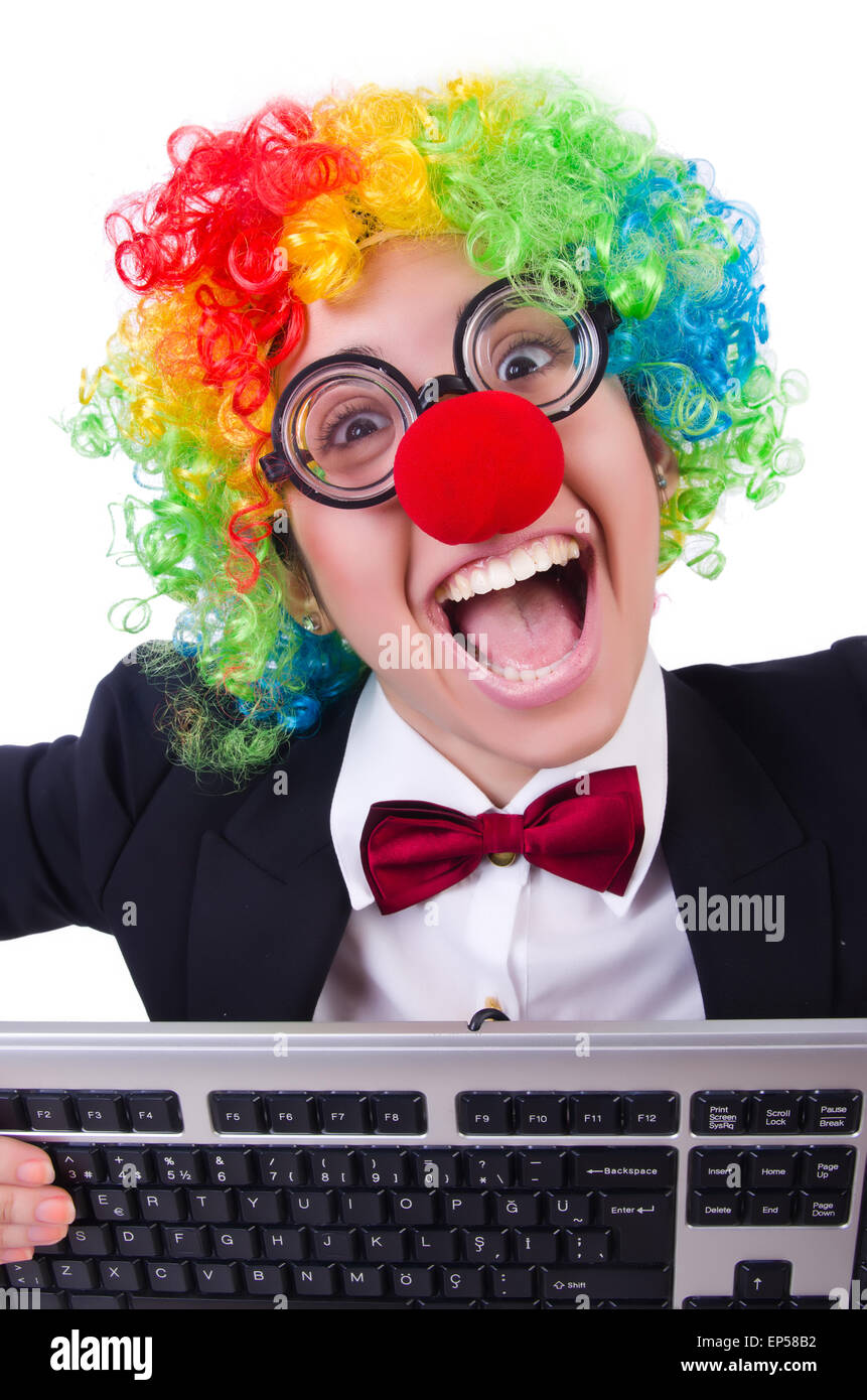 Funny clown with keyboard on white Stock Photo - Alamy