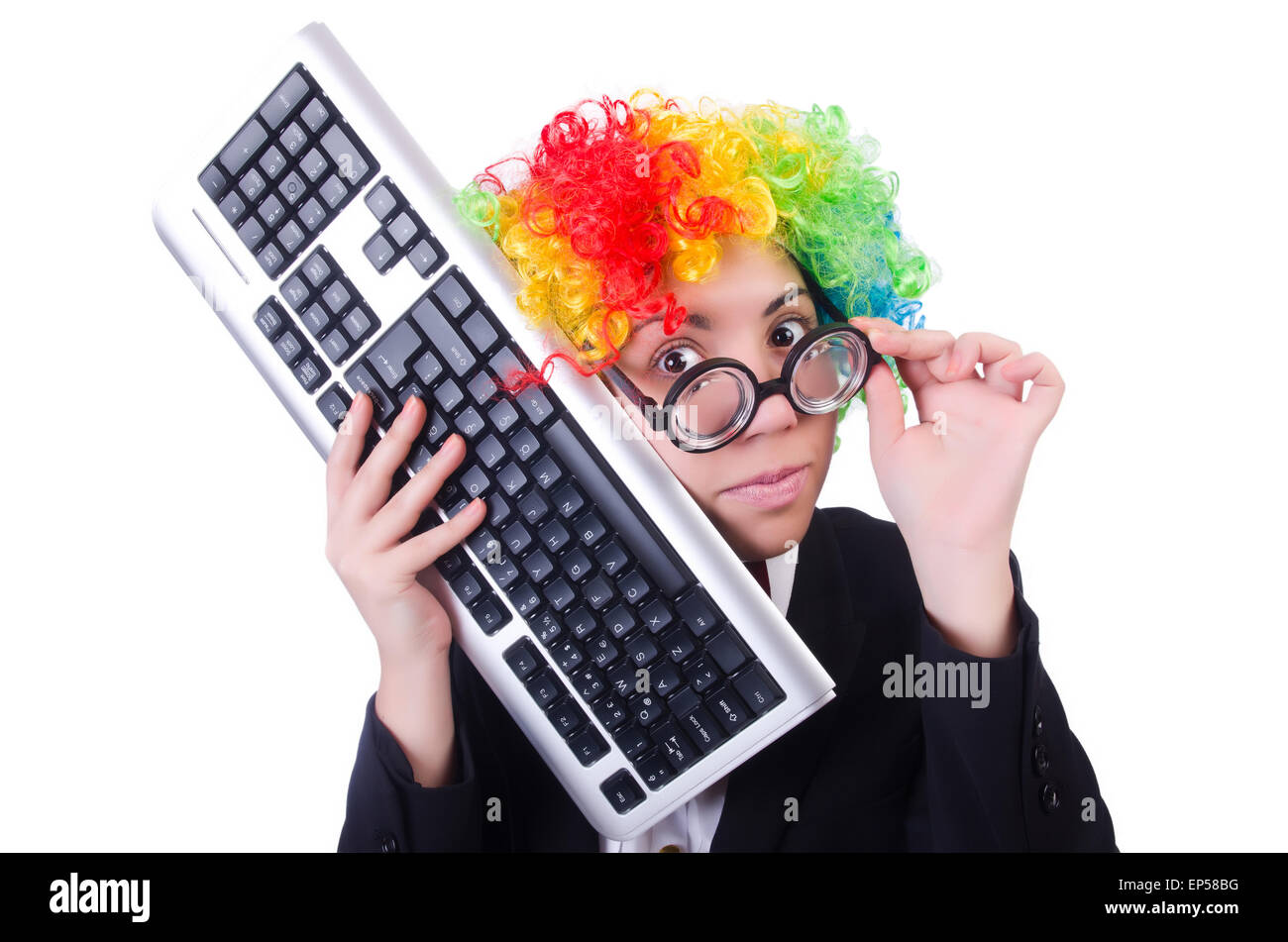Funny clown with keyboard on white Stock Photo - Alamy