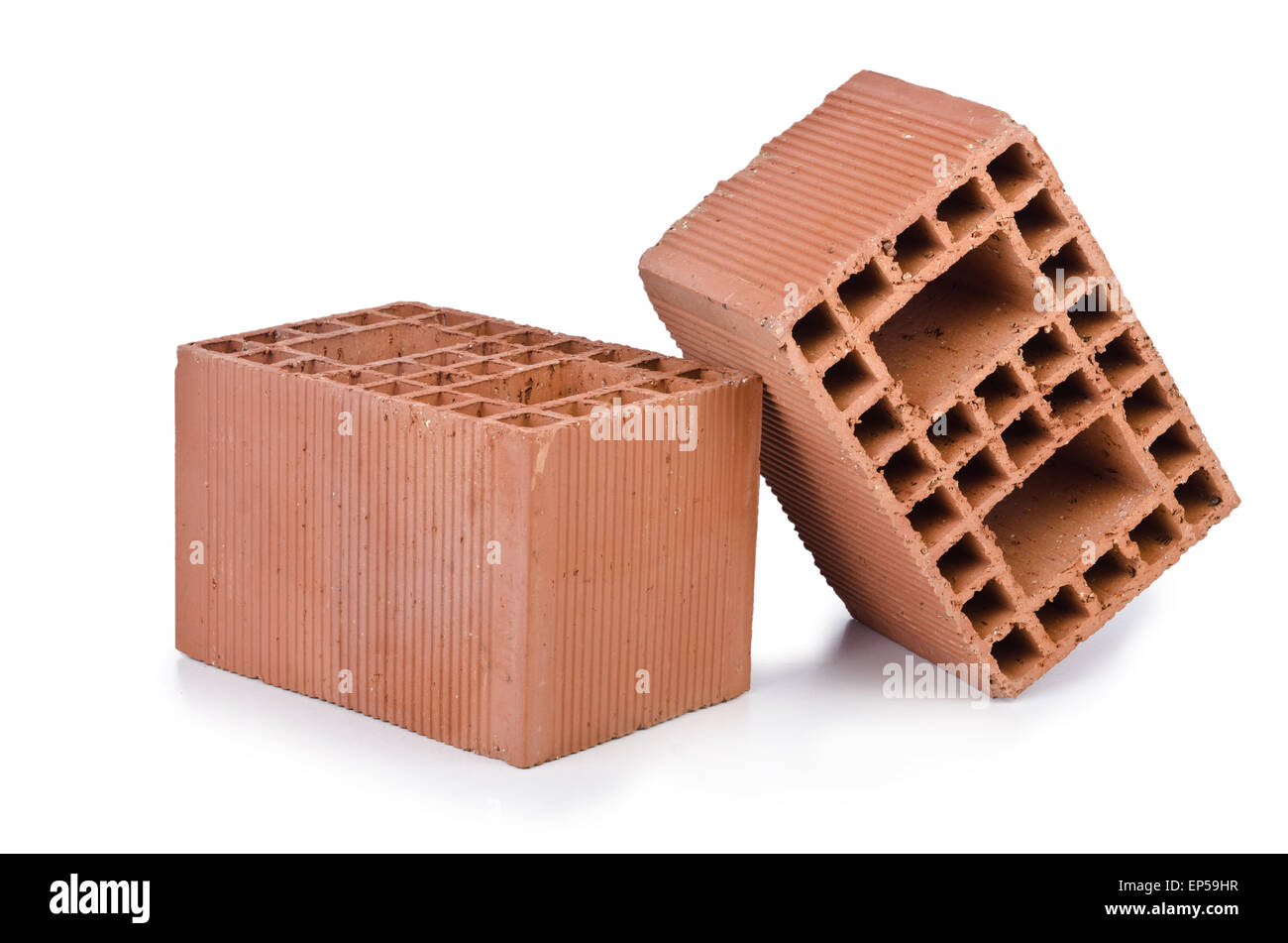 Stack of clay bricks isolated on white Stock Photo - Alamy
