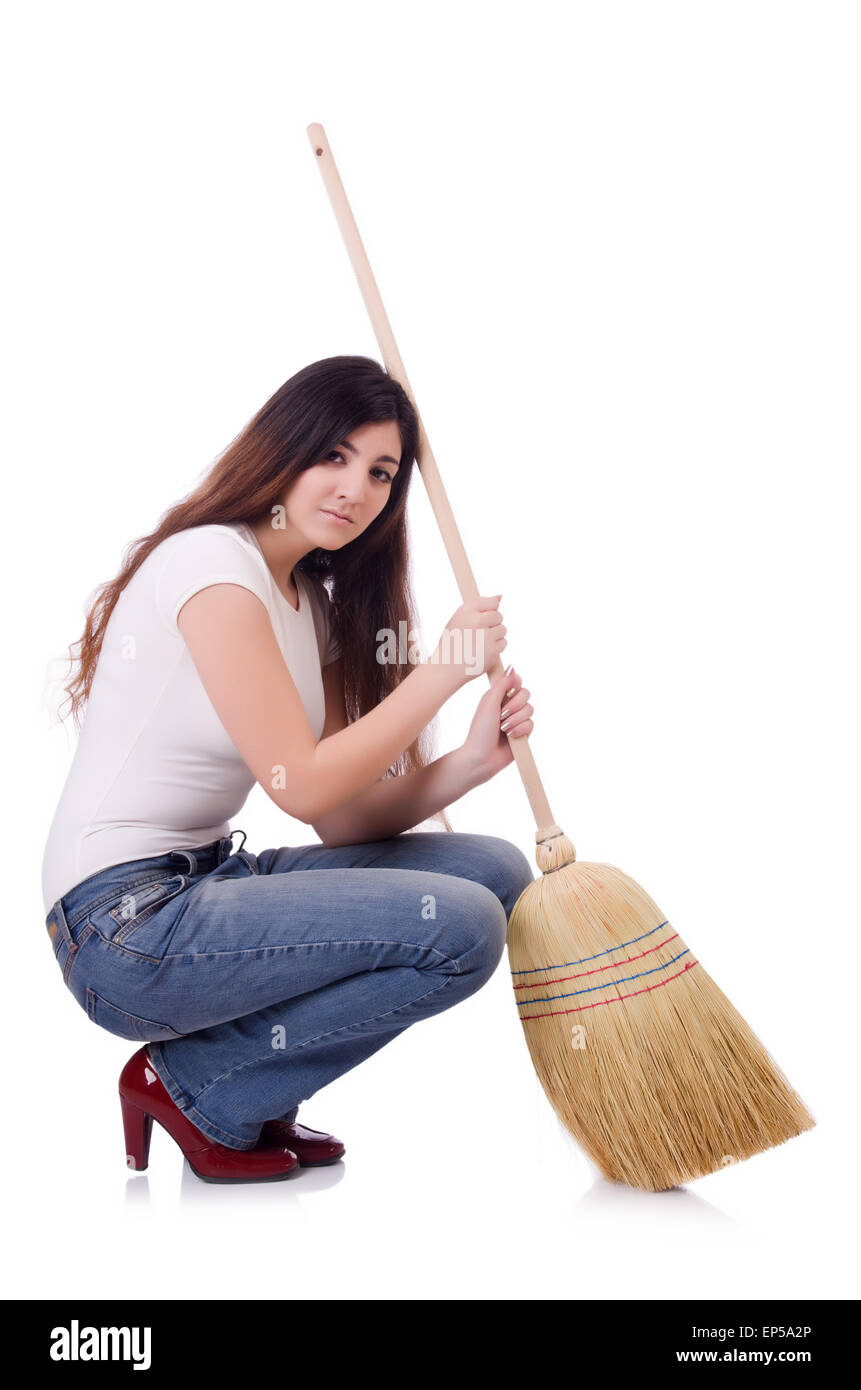 Young woman with broom isolated on white Stock Photo - Alamy