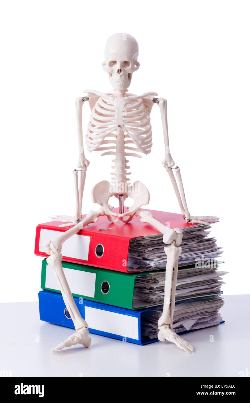 Skeleton with pile of files on white Stock Photo - Alamy