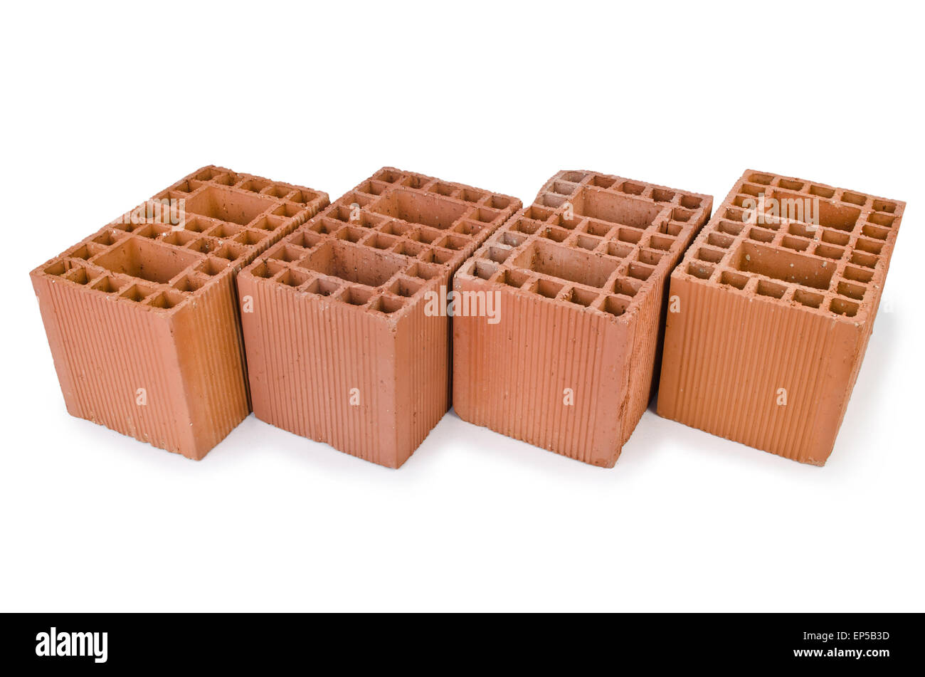Stack of clay bricks isolated on white Stock Photo - Alamy