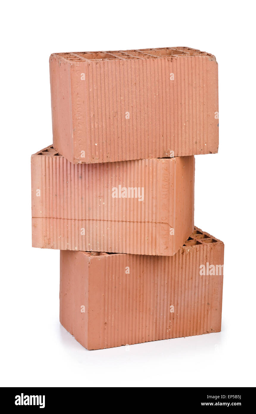 Stack of clay bricks isolated on white Stock Photo - Alamy
