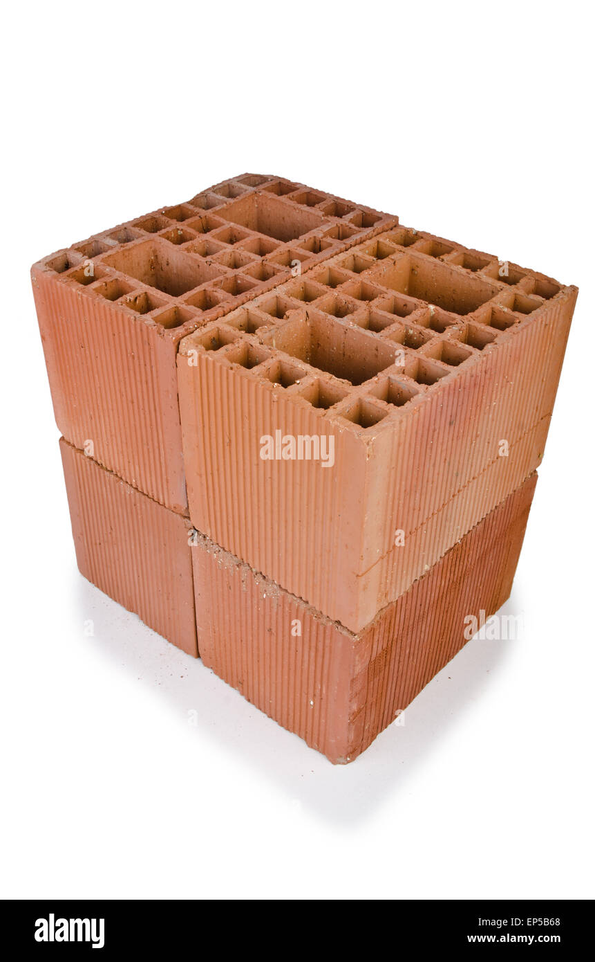Stack of clay bricks isolated on white Stock Photo - Alamy