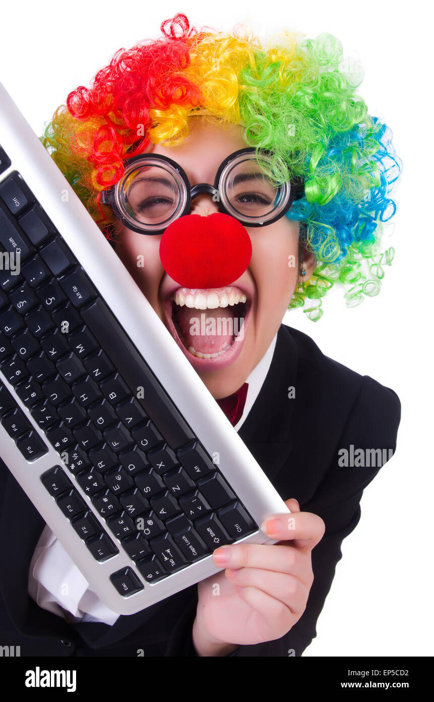 Funny clown with keyboard on white Stock Photo - Alamy