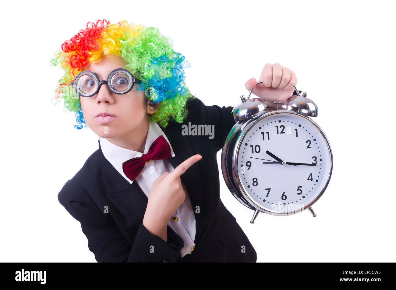 Funny clown with clock on white Stock Photo - Alamy