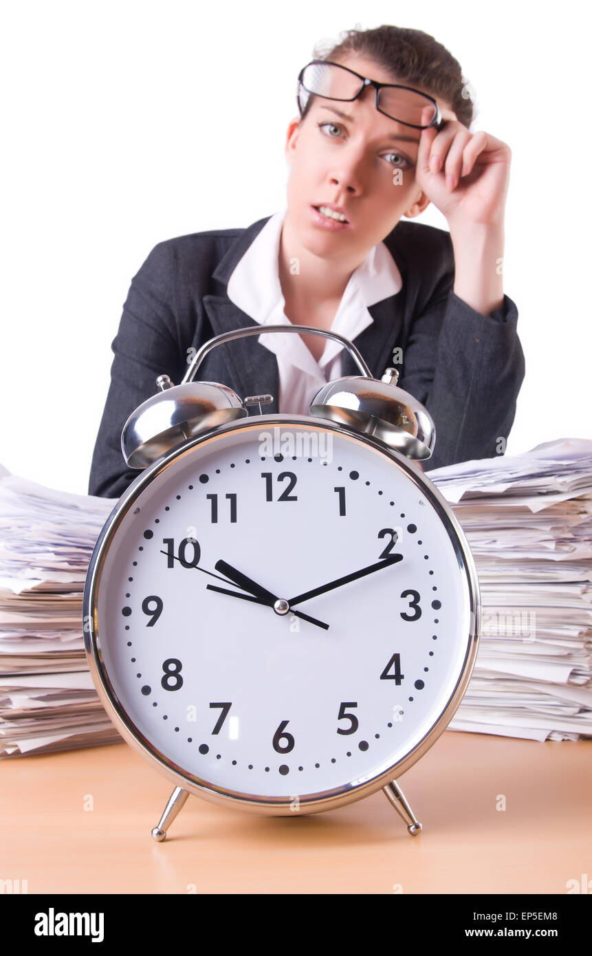 Woman businesswoman with giant alarm clock Stock Photo - Alamy