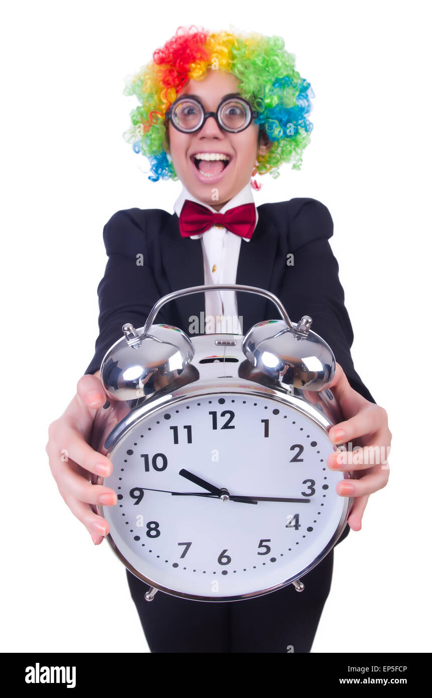 Funny clown with clock on white Stock Photo - Alamy