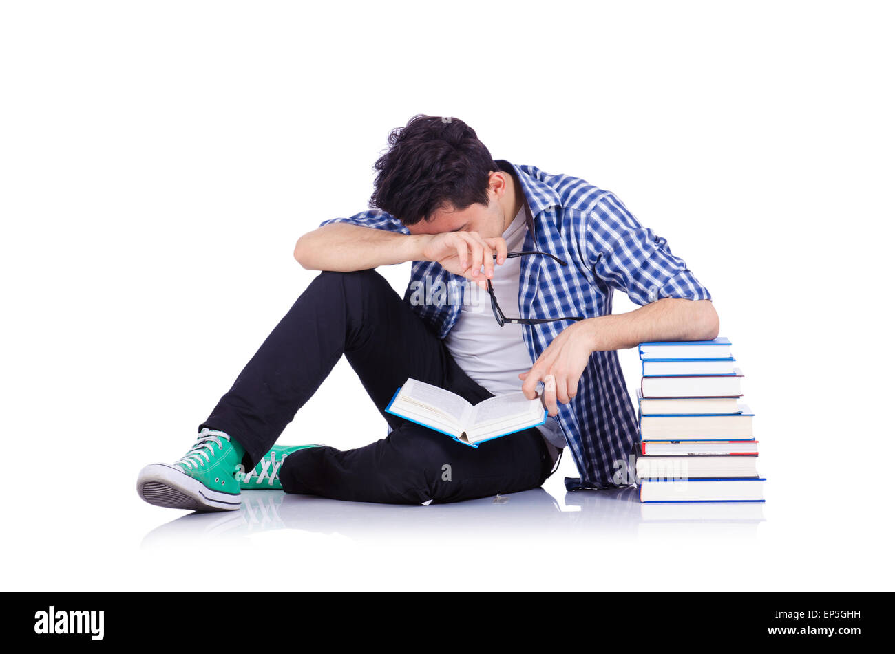 Student with lots of books on white Stock Photo - Alamy
