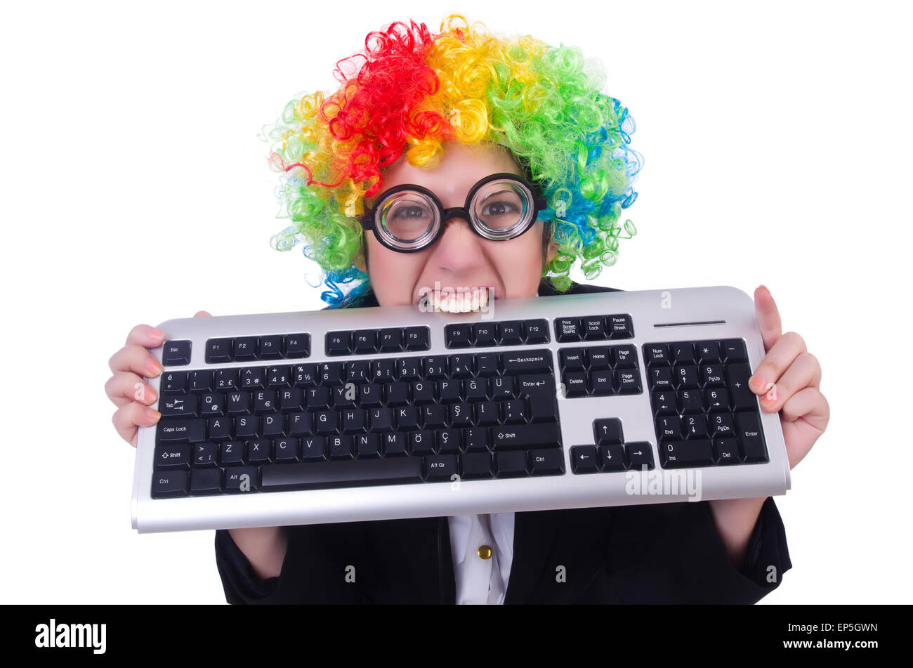 Funny clown with keyboard on white Stock Photo - Alamy