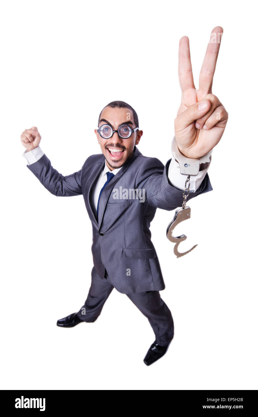Funny businessman with handcuffs on white Stock Photo - Alamy
