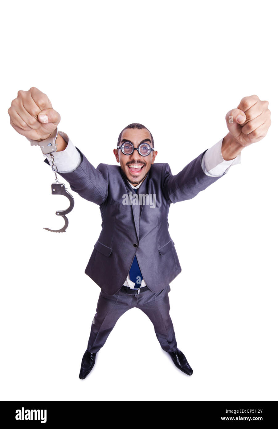 Funny businessman with handcuffs on white Stock Photo - Alamy