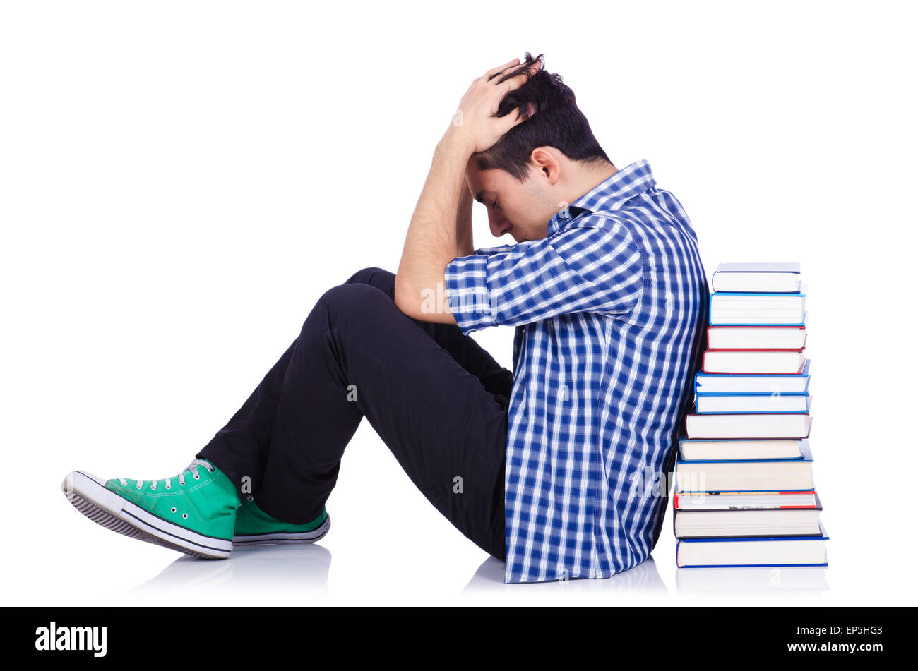 Student with lots of books on white Stock Photo - Alamy