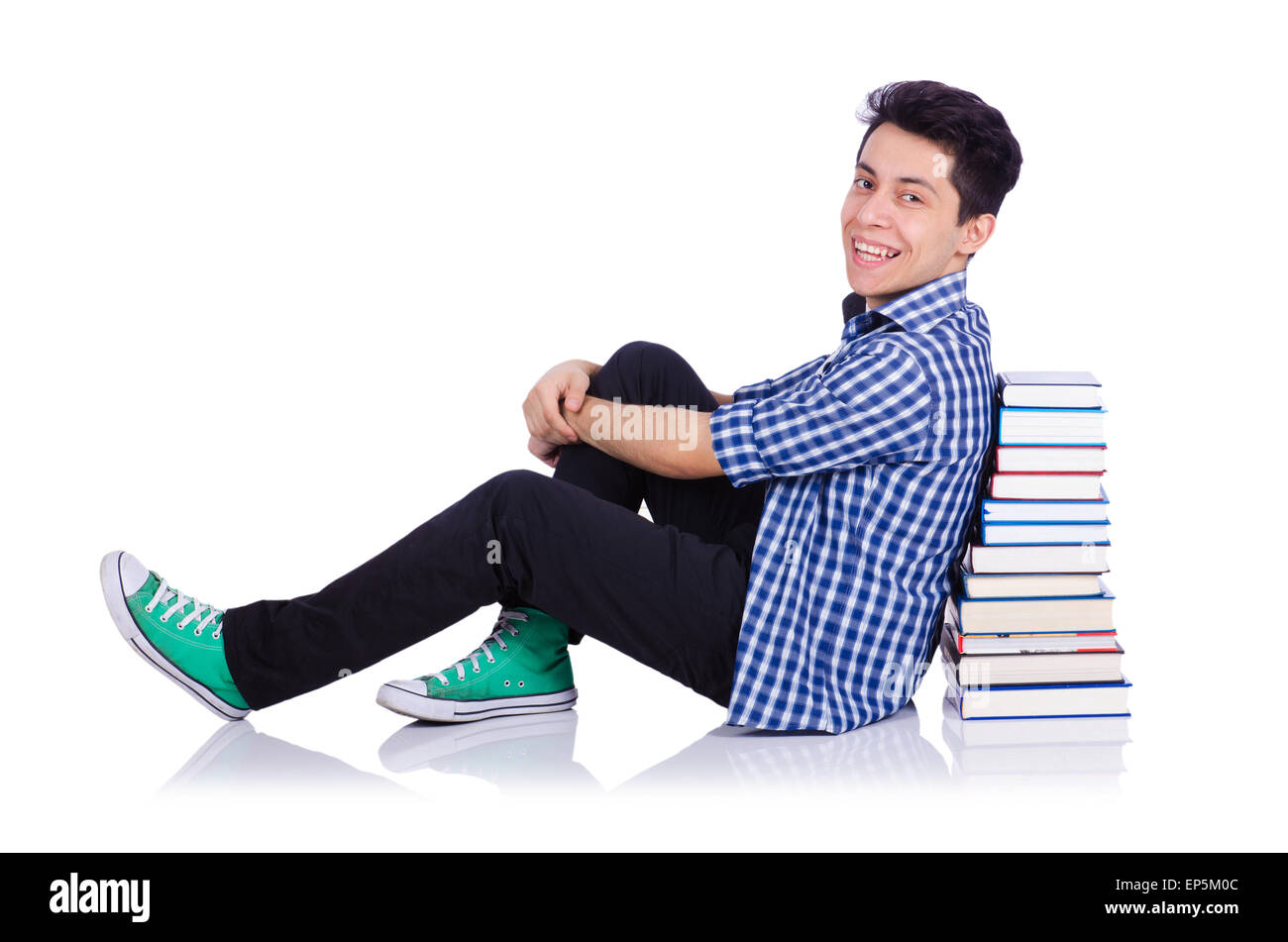 Student with lots of books on white Stock Photo - Alamy