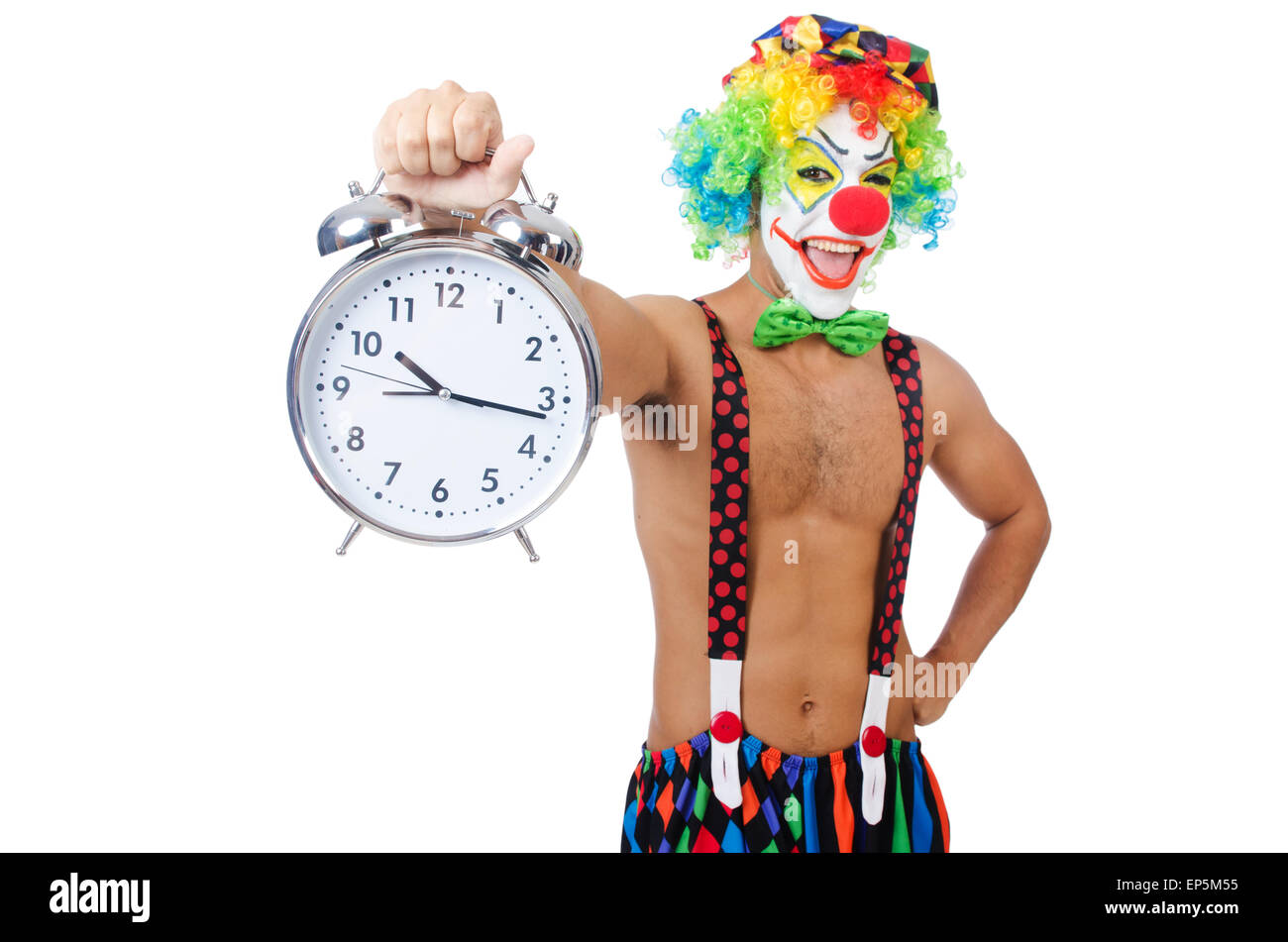 Clown with alarm clock on white Stock Photo - Alamy