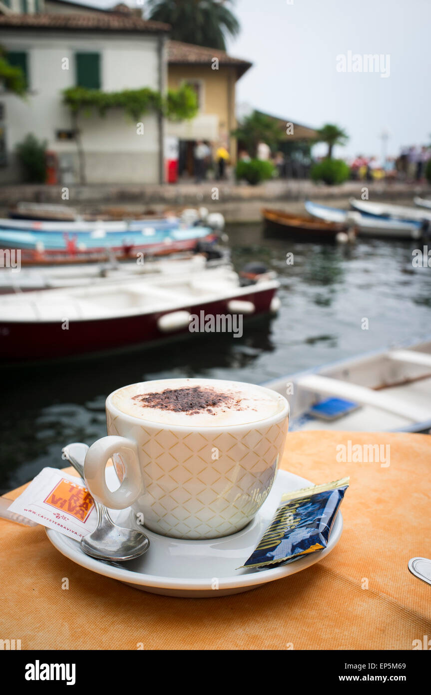 Coffee beside the Lake in Lake Garda, Italy Stock Photo - Alamy