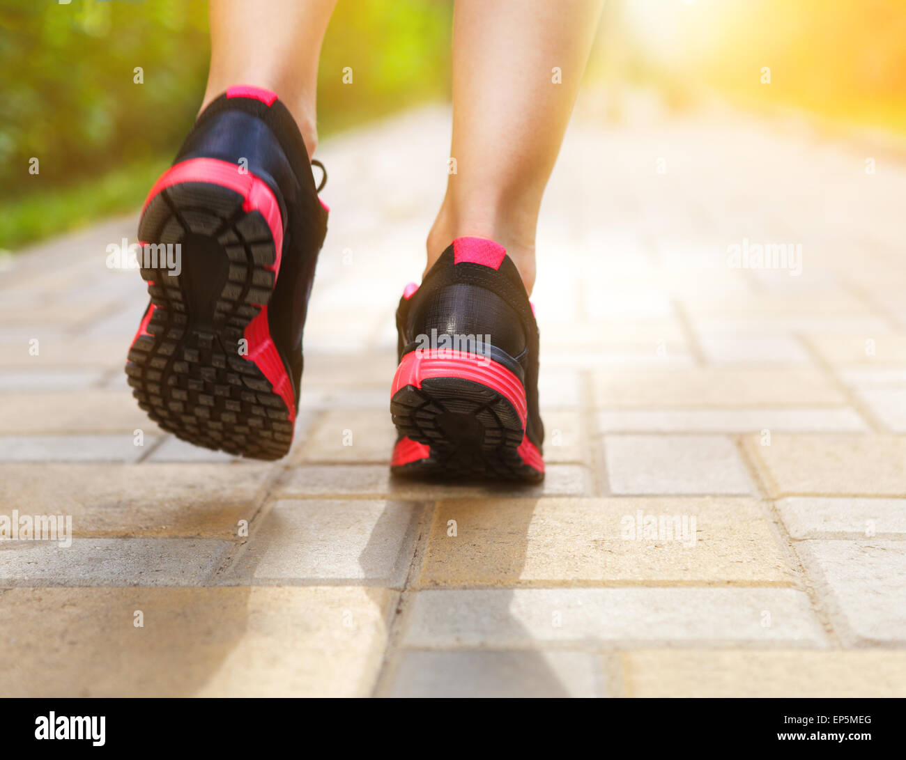 Runner feet running on road closeup on shoes Stock Photo - Alamy