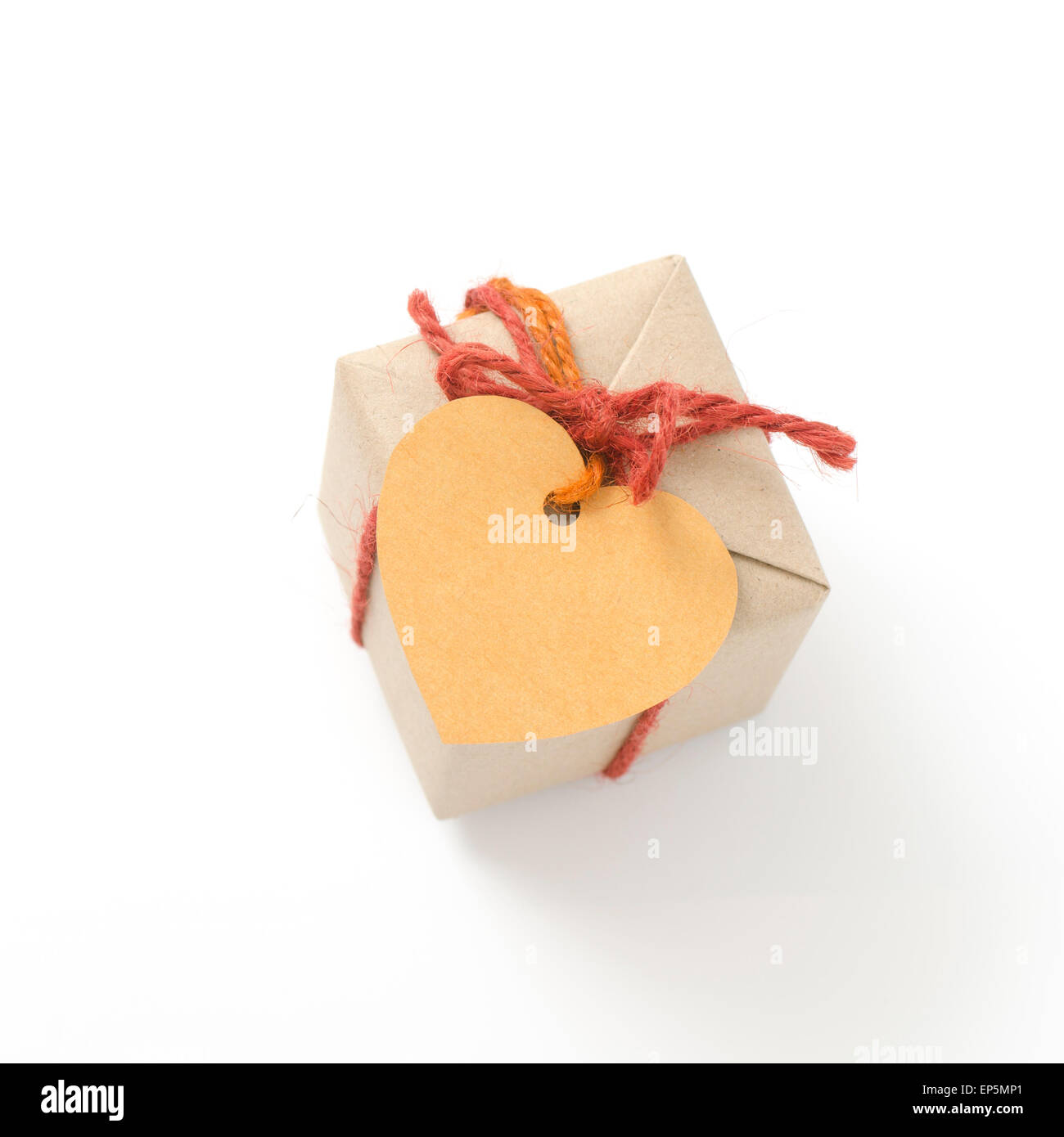 heart tag with single craft cardboard gift box on a white background ...