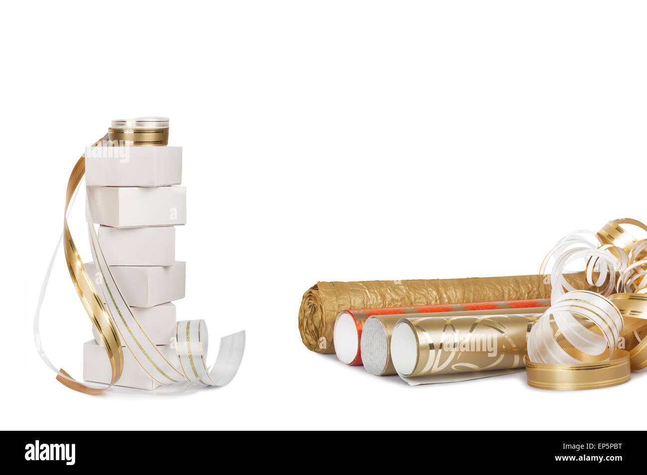 Gift boxes and rolls of wrapping paper with multicolored streamers for ...