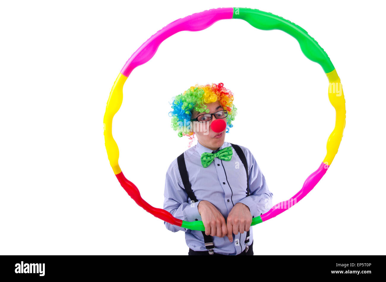 Funny clown with hula hoop on white Stock Photo - Alamy