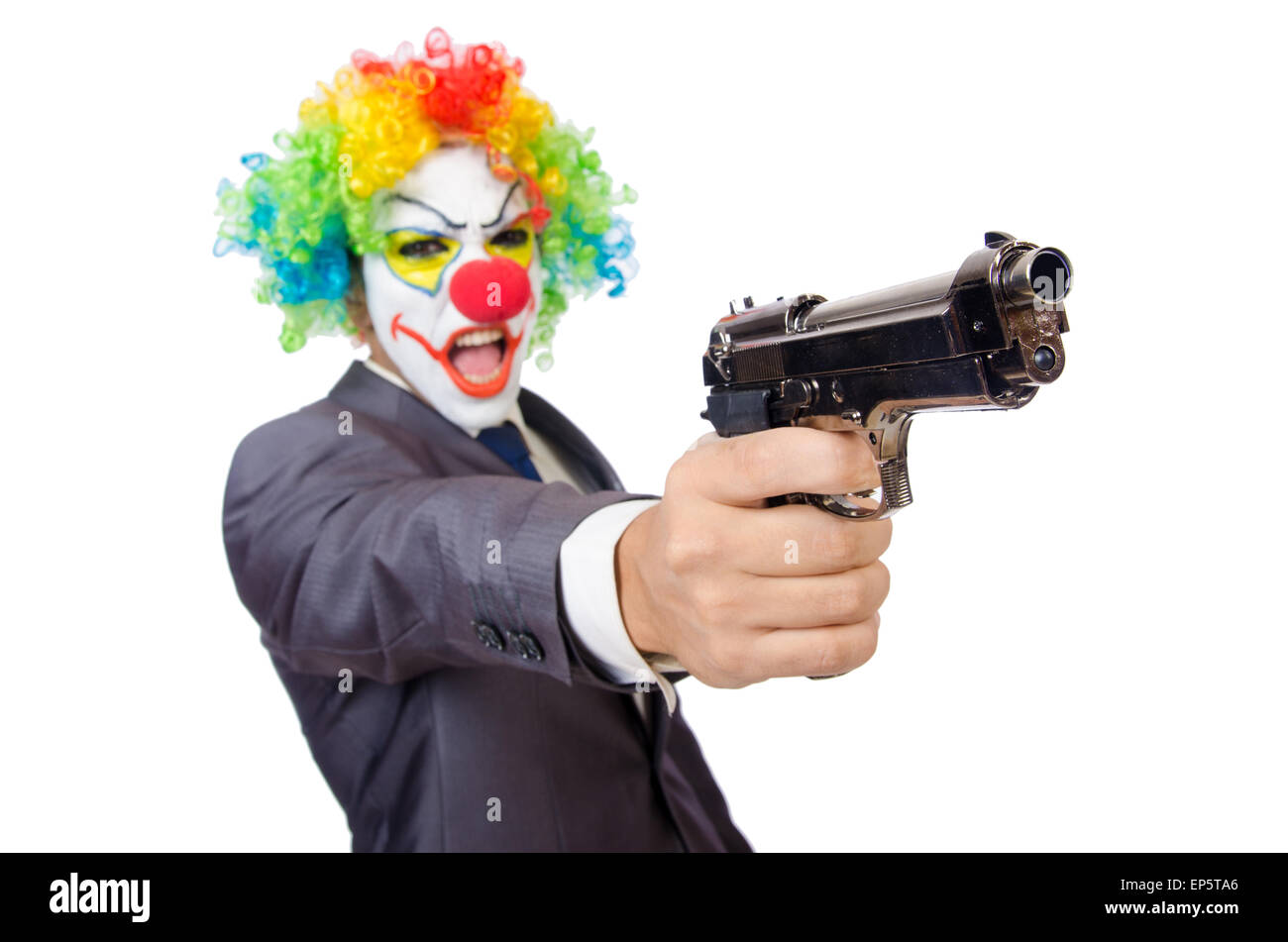 Businessman clown with gun isolated on white Stock Photo - Alamy