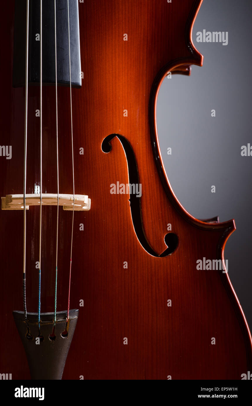 Violing against the dark background Stock Photo - Alamy