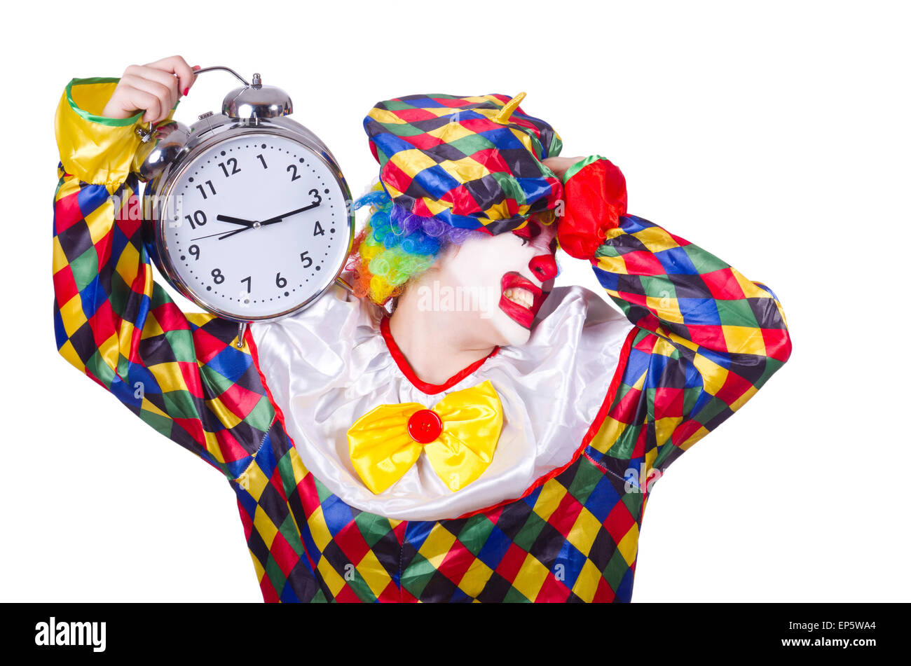 Clown with alarm clock isolated on white Stock Photo - Alamy