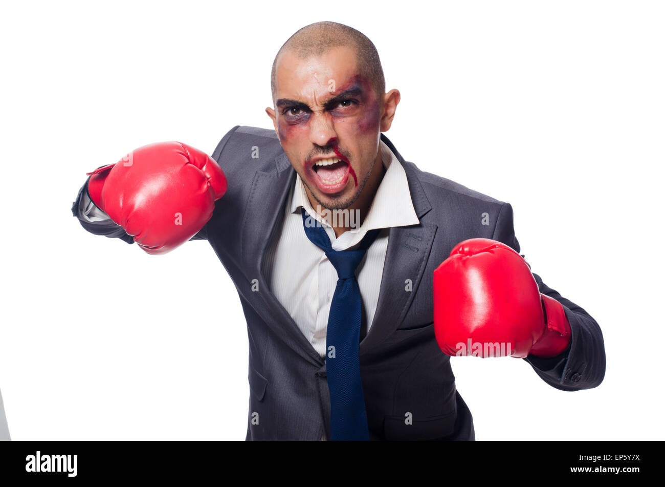 Badly beaten businessman with boxing gloves Stock Photo - Alamy