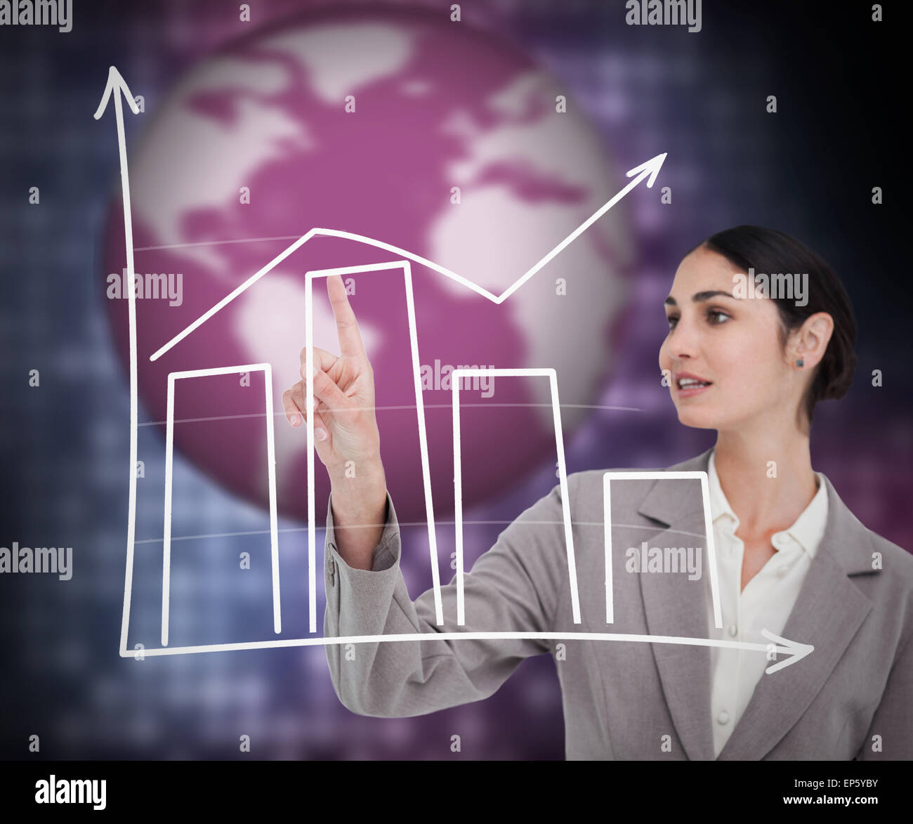 Brunette businesswoman using graphical presentation Stock Photo - Alamy