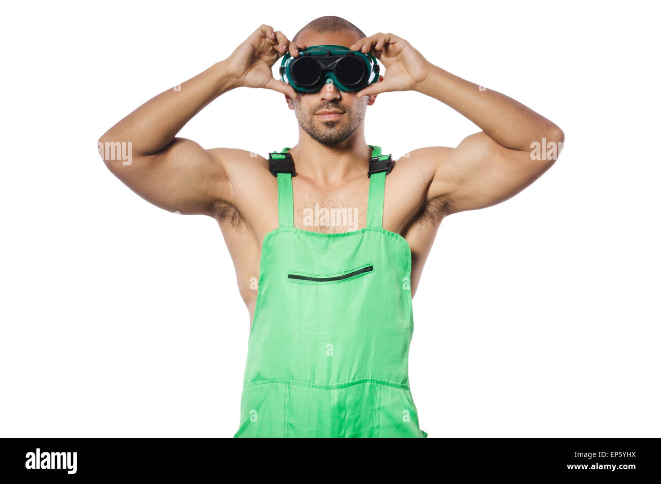 Man in green coveralls with goggles Stock Photo - Alamy