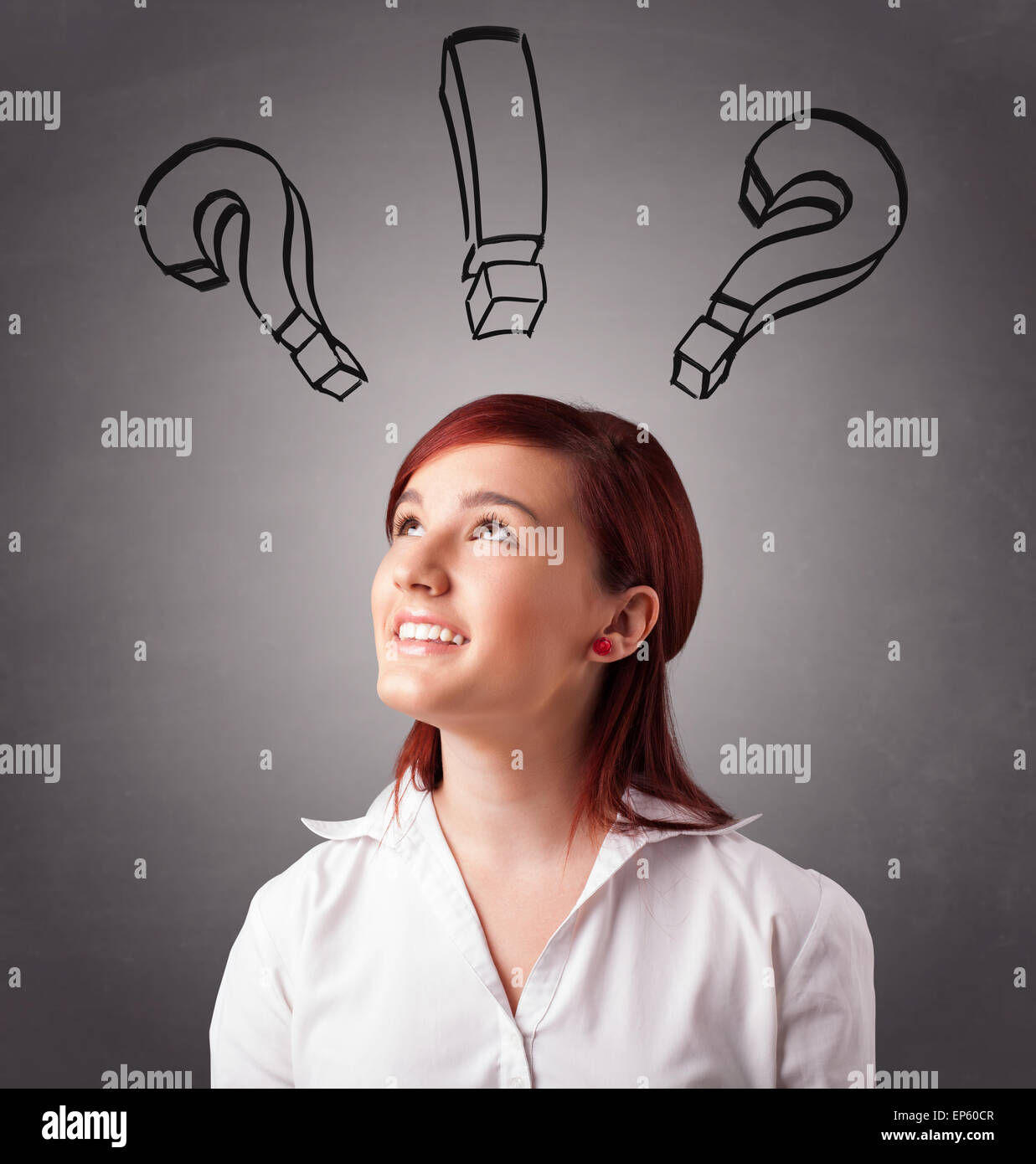 Young lady thinking with question marks overhead Stock Photo - Alamy