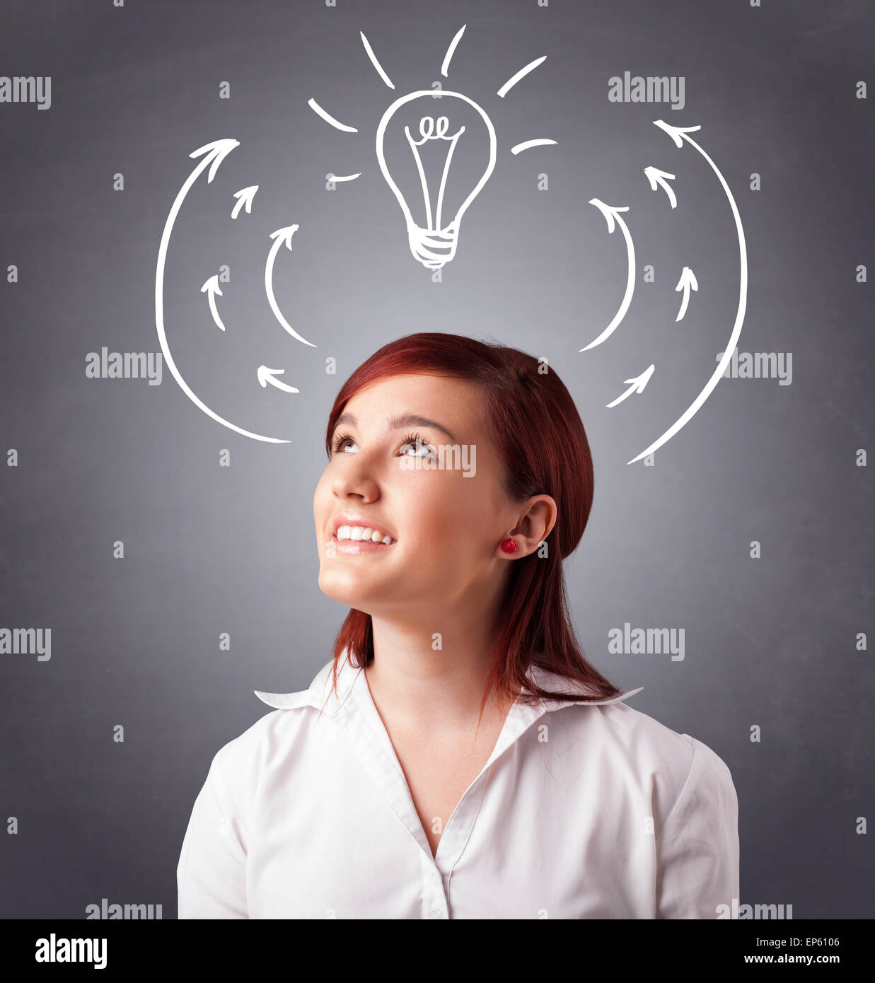 Pretty lady thinking with arrows and light bulb overhead Stock Photo ...