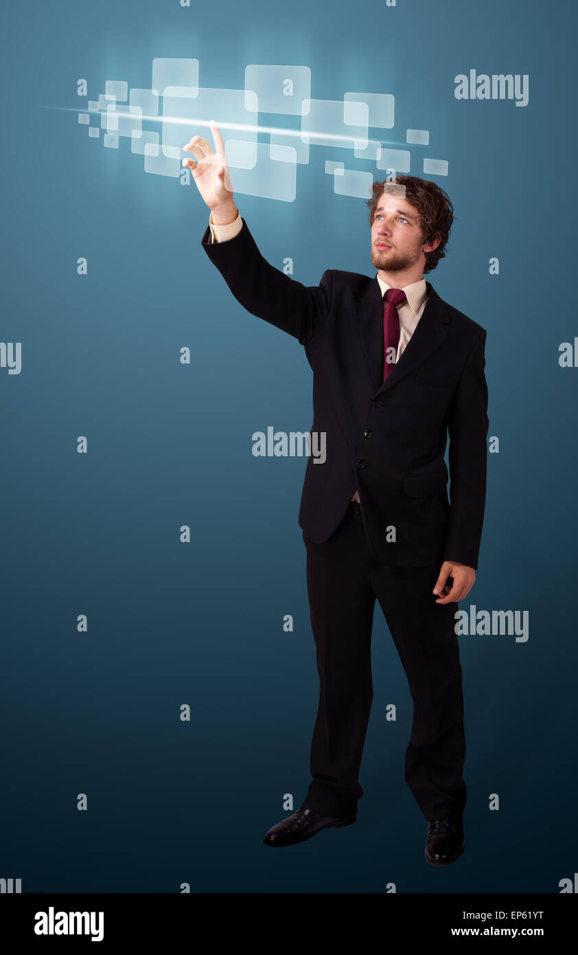 Businessman pressing high tech type of modern buttons Stock Photo - Alamy