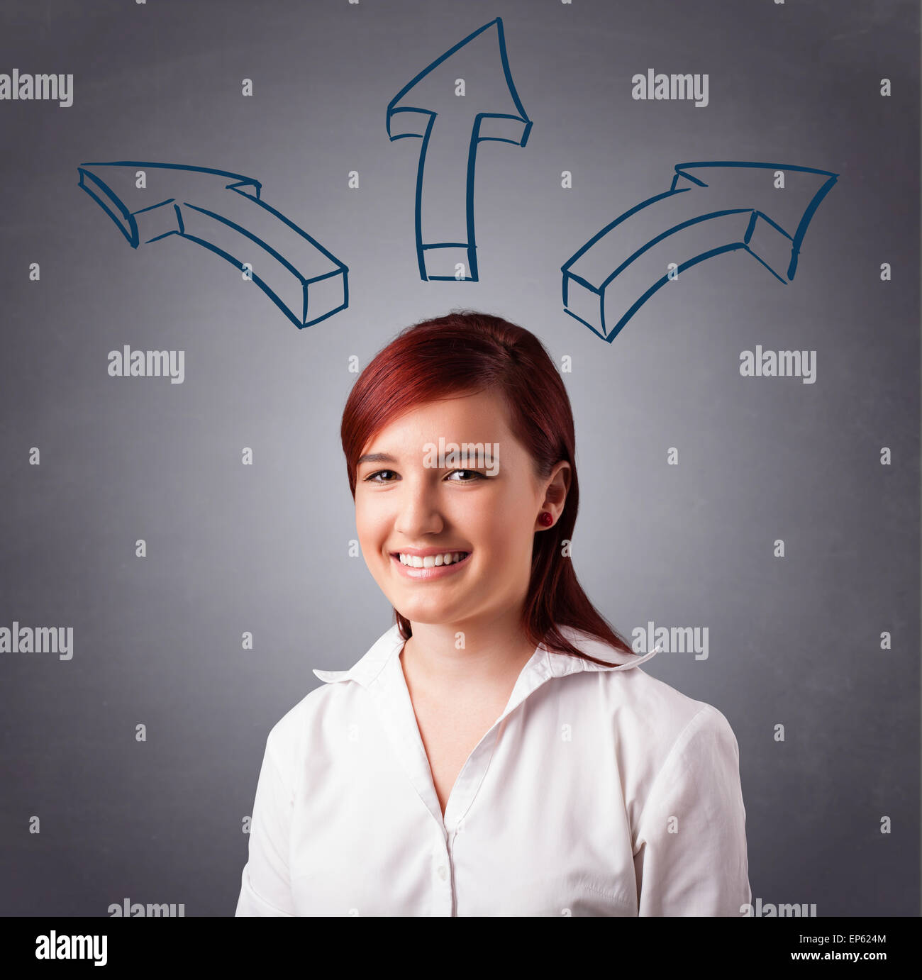 Pretty lady thinking with arrows overhead Stock Photo - Alamy