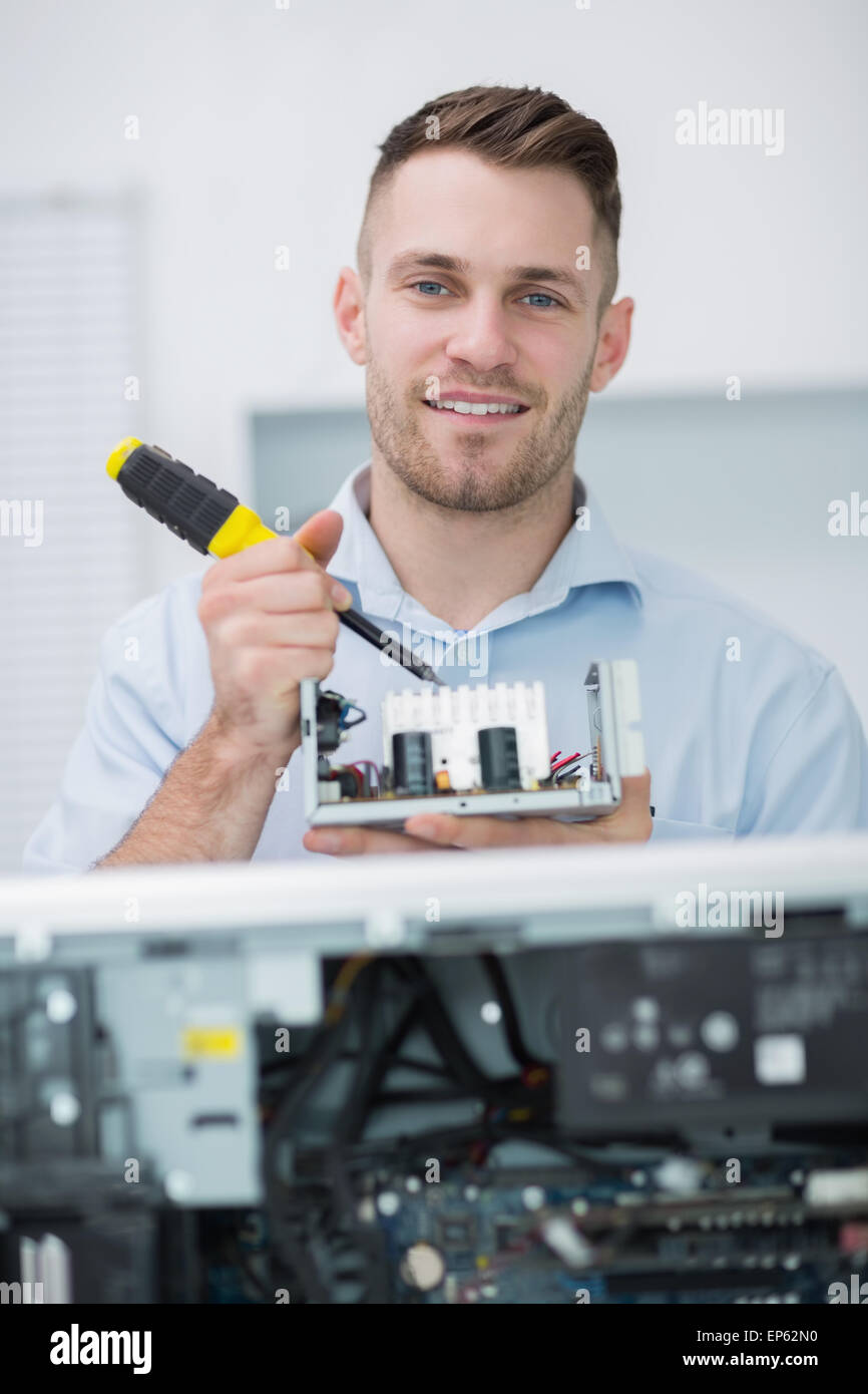 Computer engineer working on cpu part in front of open cpu Stock Photo ...