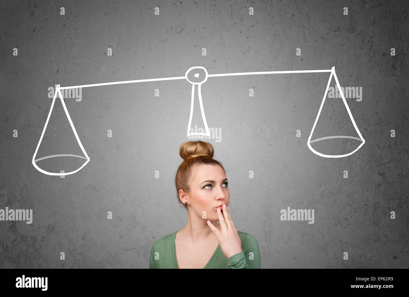 Young woman taking a decision Stock Photo - Alamy