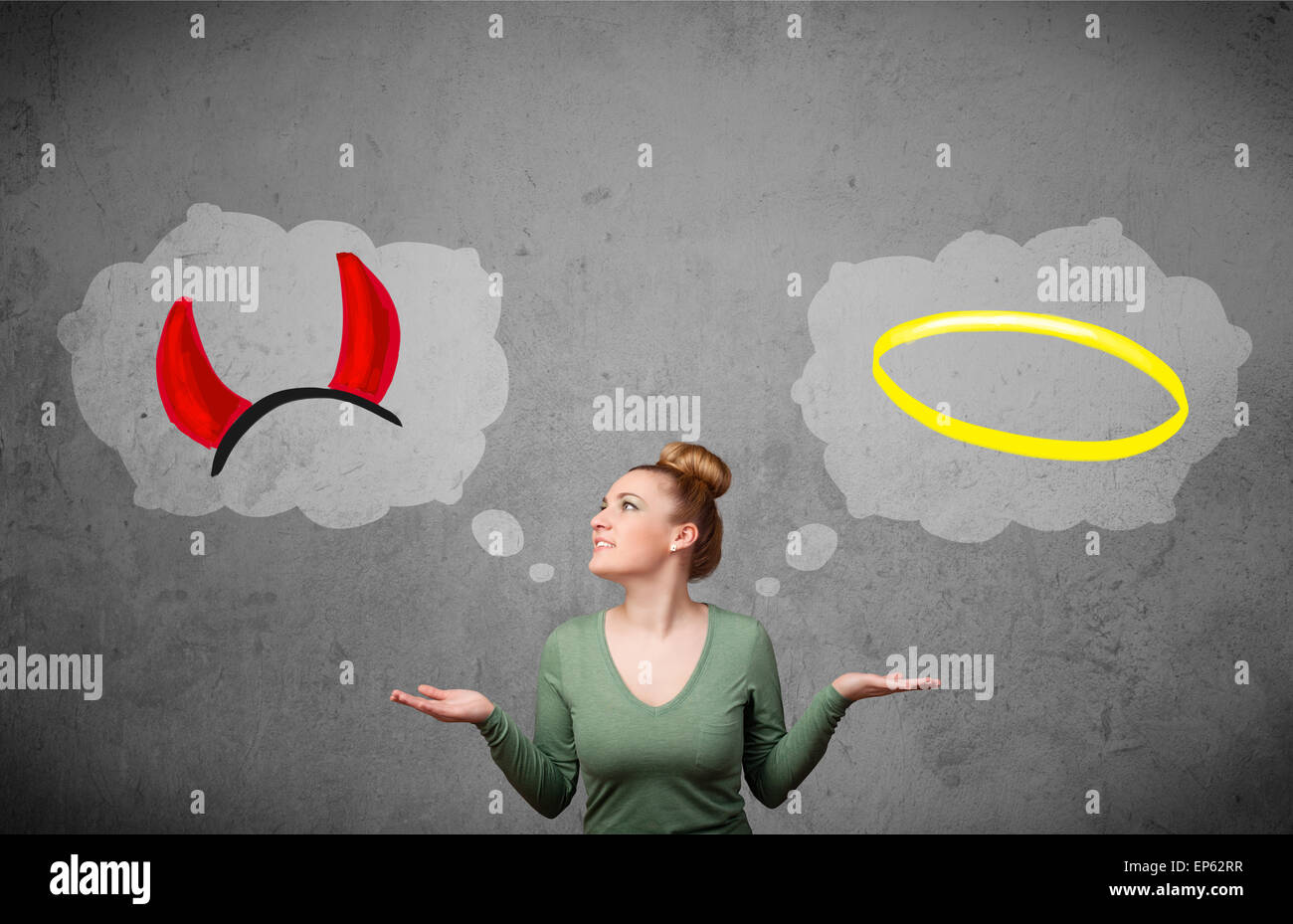 Woman choosing between good and bad Stock Photo - Alamy