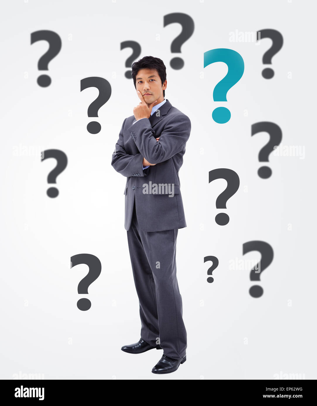 Businessman thinking on question mark background Stock Photo - Alamy