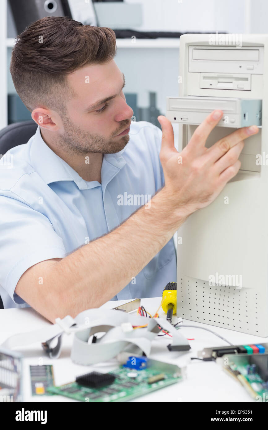 Inserting cpu hi-res stock photography and images - Alamy