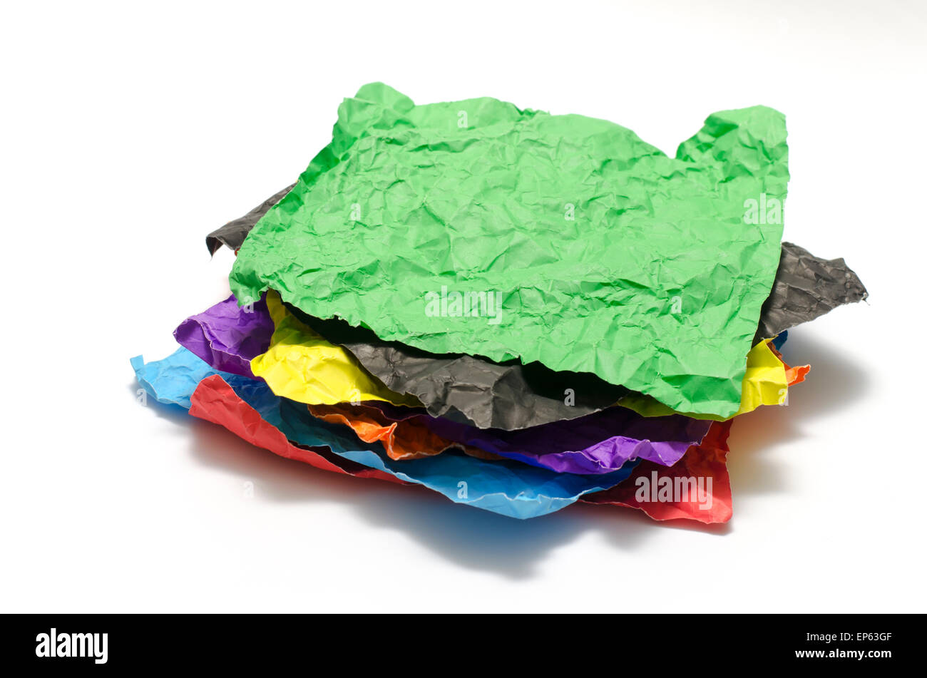 color crumpled paper on a white background Stock Photo - Alamy