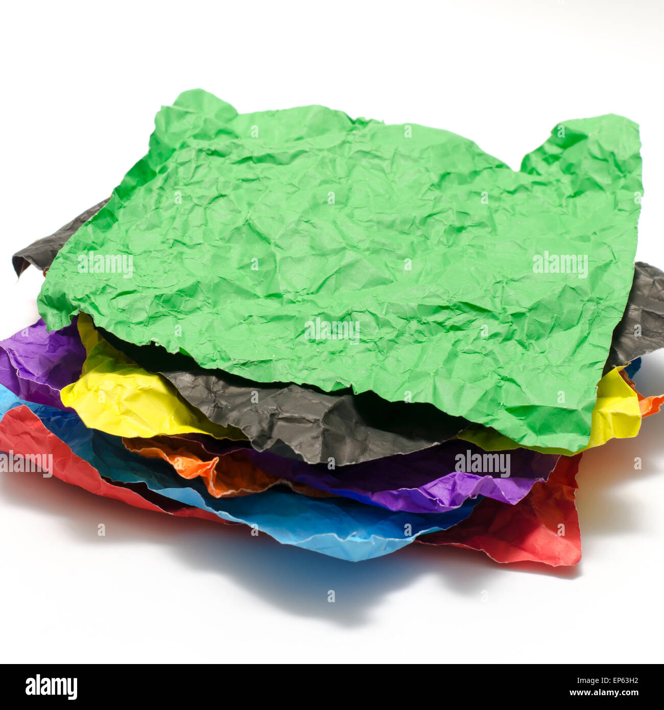 color crumpled paper on a white background Stock Photo - Alamy