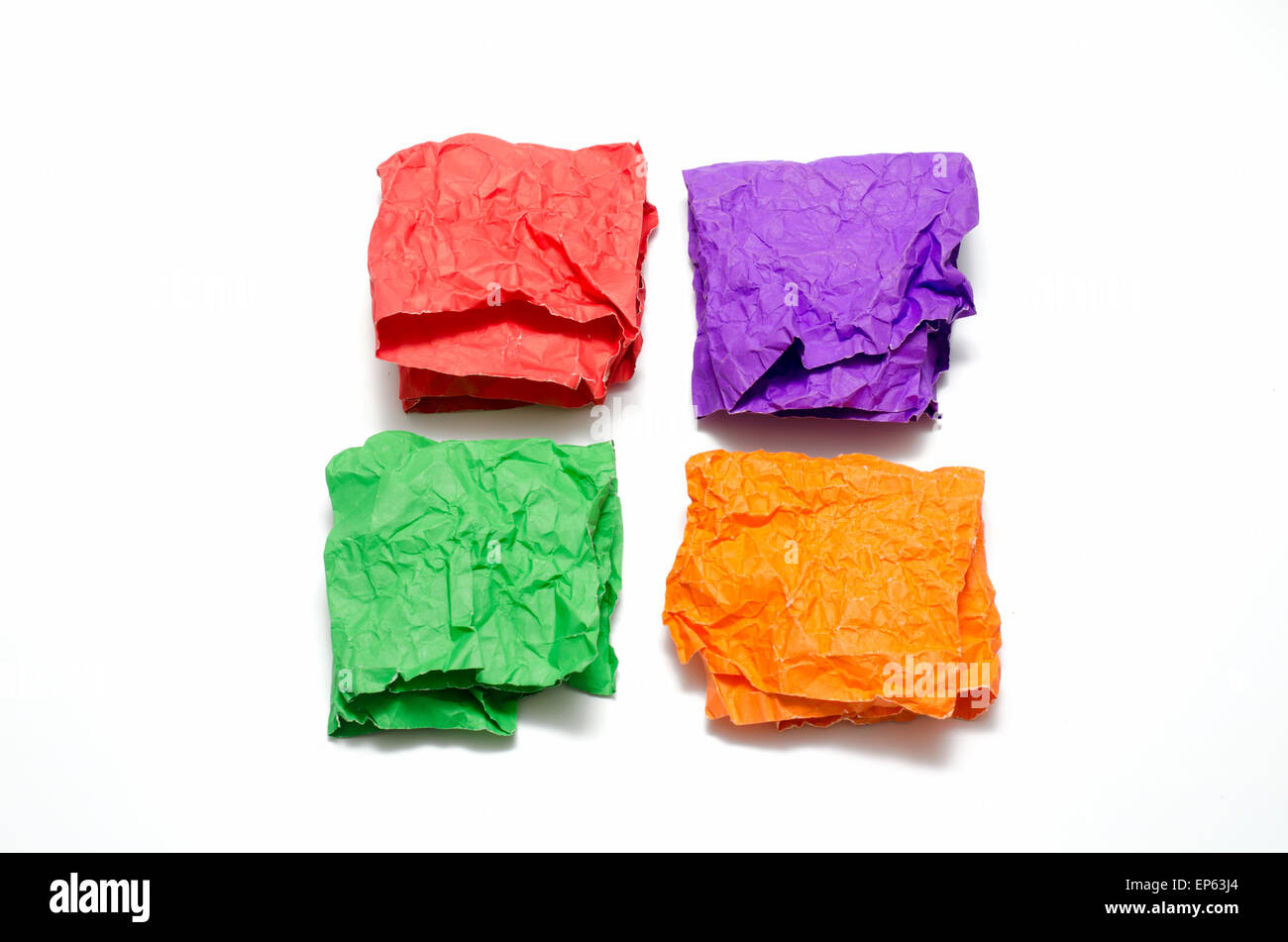 color crumpled paper on a white background Stock Photo - Alamy
