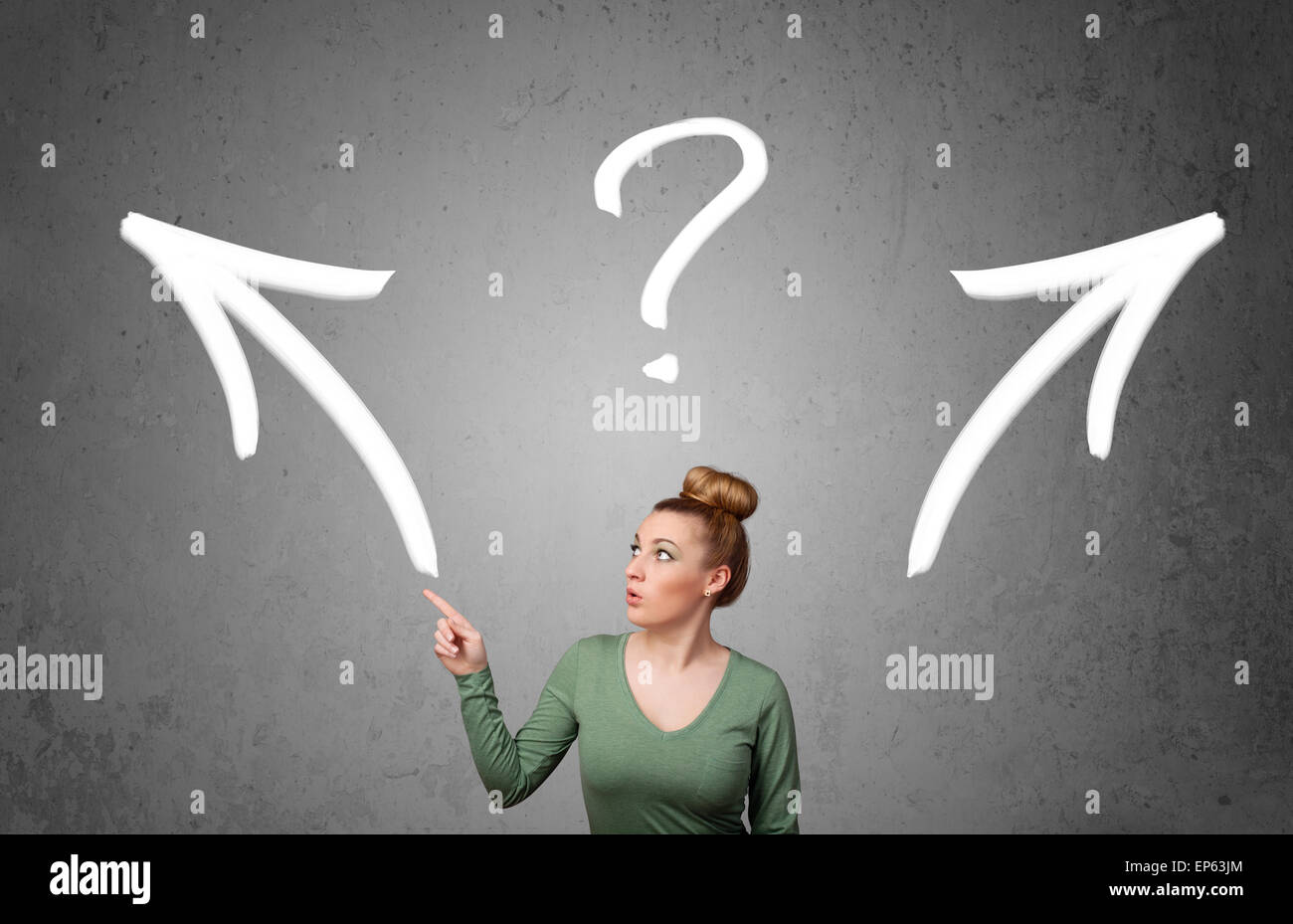 Young woman taking a decision Stock Photo - Alamy